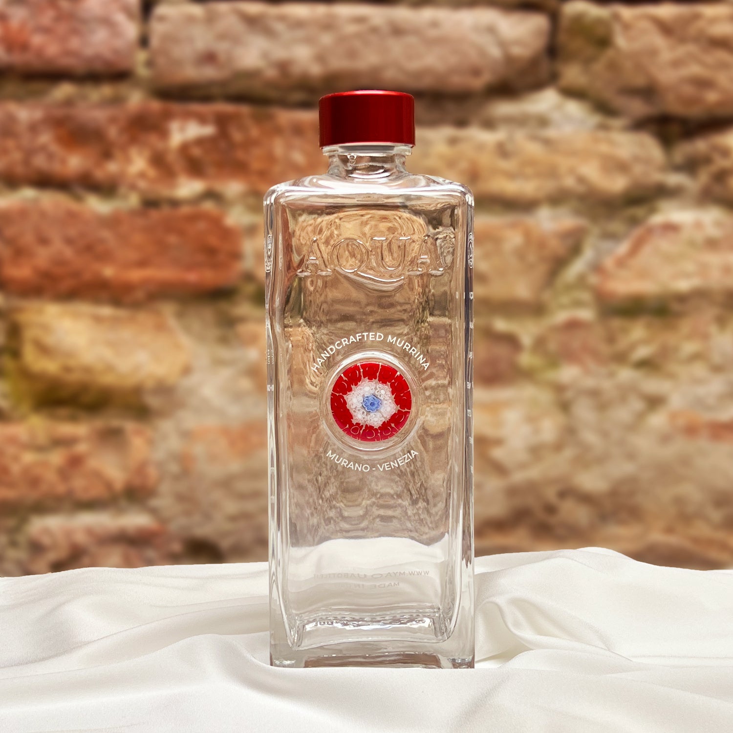 Glass bottle with Murrina handmade by Ercole Moretti, an artisan ...